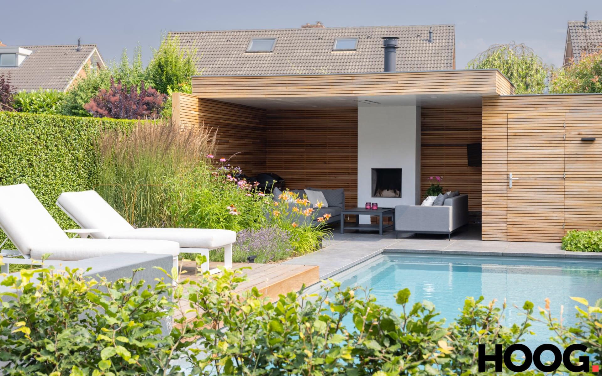 Modern garden with swimming pool pool house and sauna