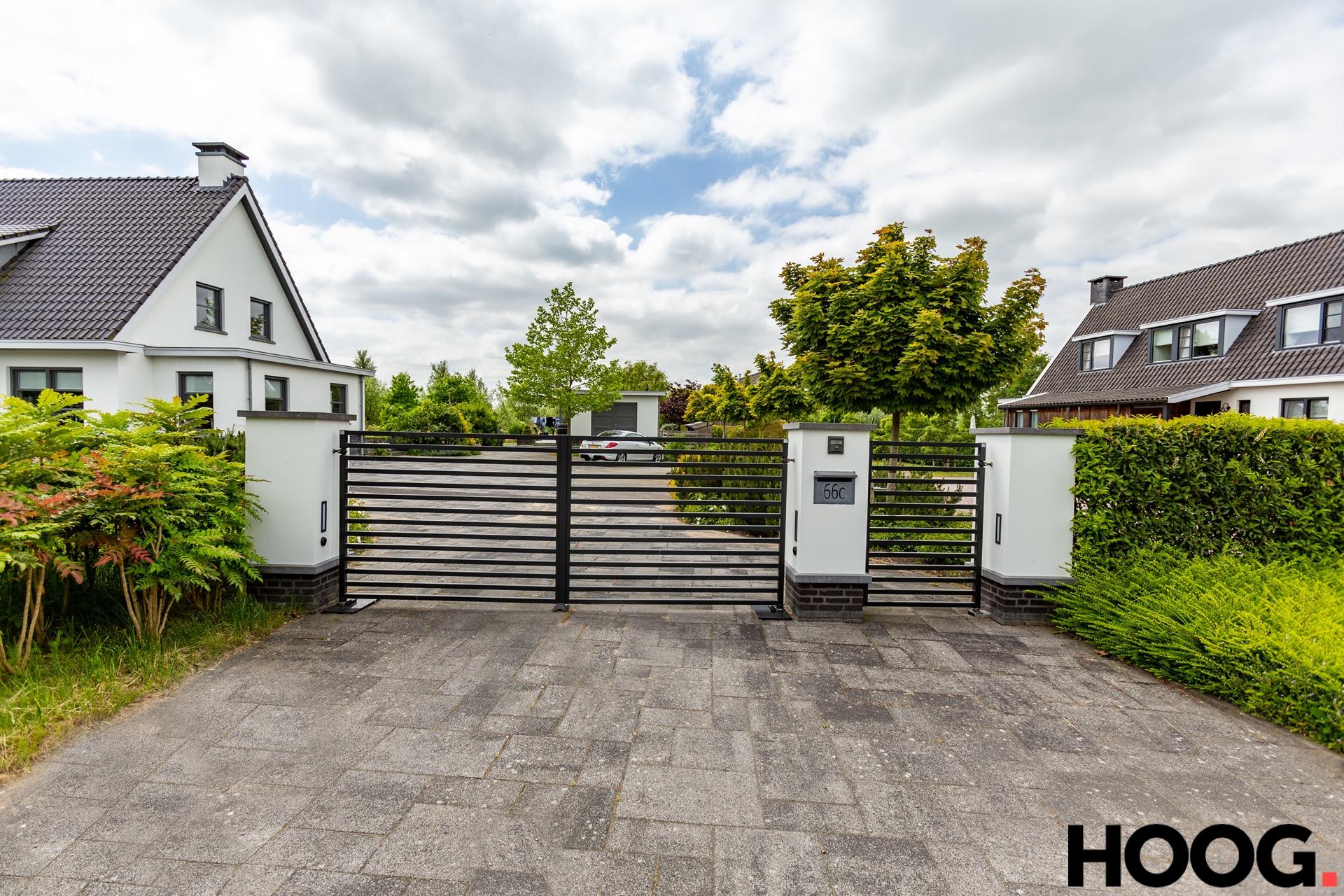 Modern gate with belgian bluestone